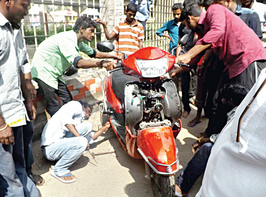 Snake Finds Safe Burrow in Scooter Chamber, Flushed Out After 3 Hrs