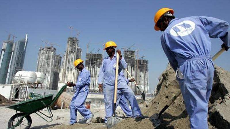 Qatar 'to introduce' minimum wage for workers