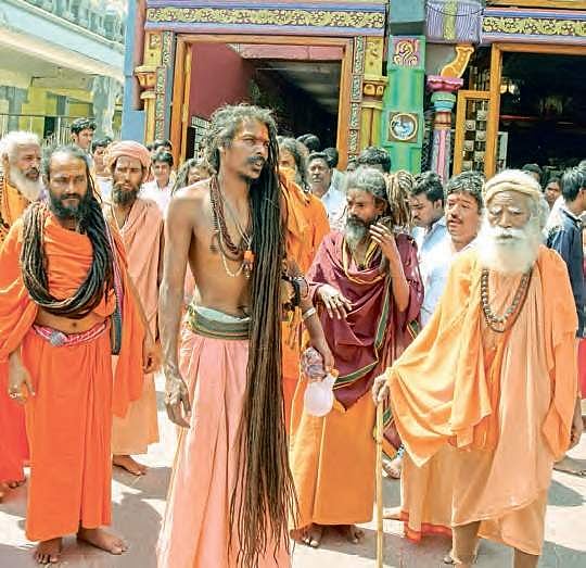 Naga sadhus visit Durga Temple
