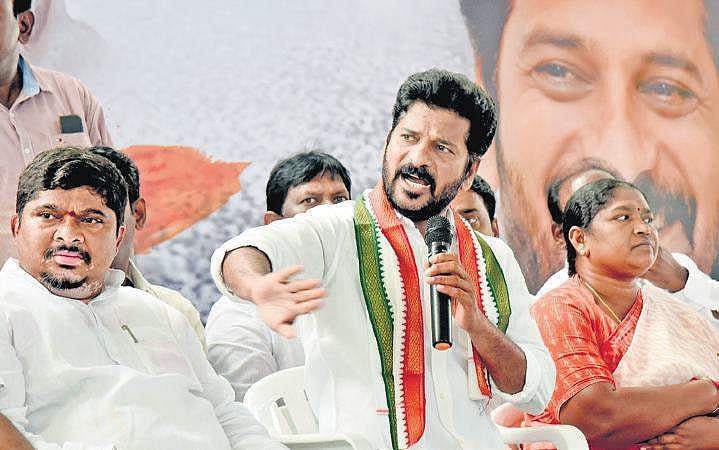 Telangana Congress MP Revanth Reddy booked for obstructing cops from ...