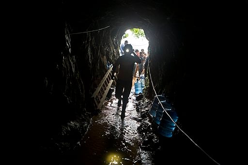 Indonesian rescuers search for 8 trapped in illegal gold mine