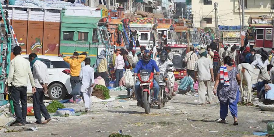 Authorities launch drive to trace contacts of trader who died of COVID ...