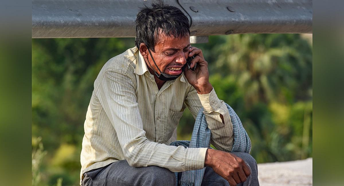 'He just wanted to go back to his dying son': Story behind viral photo ...
