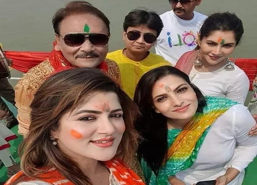 TMC candidate Madan Mitra celebrates Holi with BJP nominees on Hooghly ...