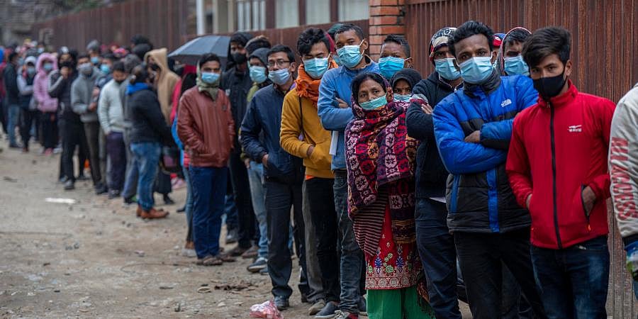Nepal imposes tough restrictions as virus cases set record