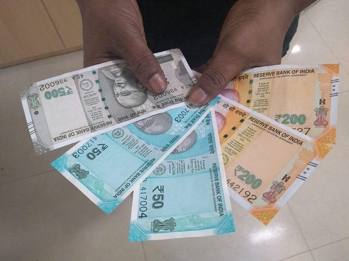 Indian national charged with money laundering, wire fraud