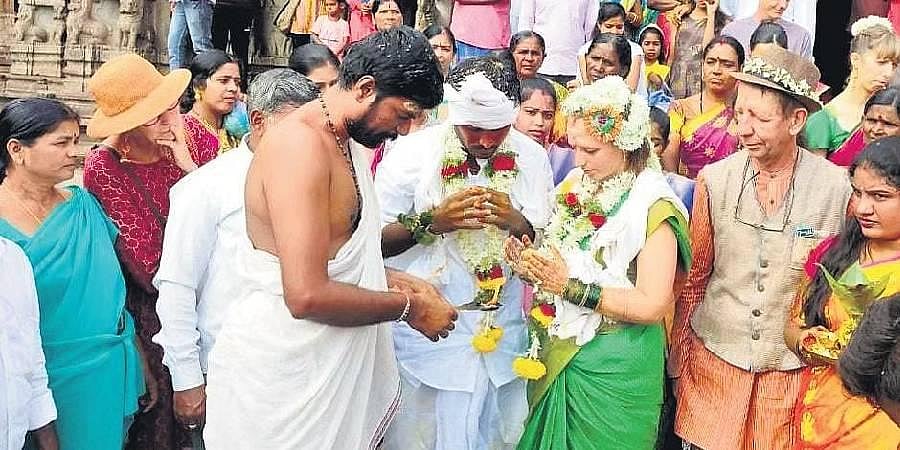 Hampi gets its firang ‘sosse’! Guide marries Belgian tourist