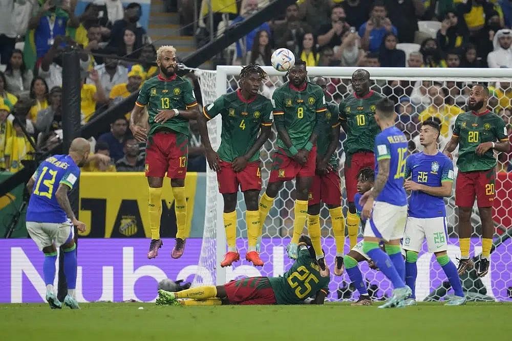 Brazil wins group despite 1-0 loss to Cameroon at World Cup