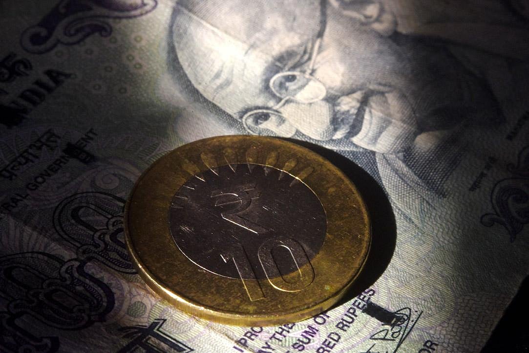 Rupee gains 5 paise to close at 78.98 against US dollar