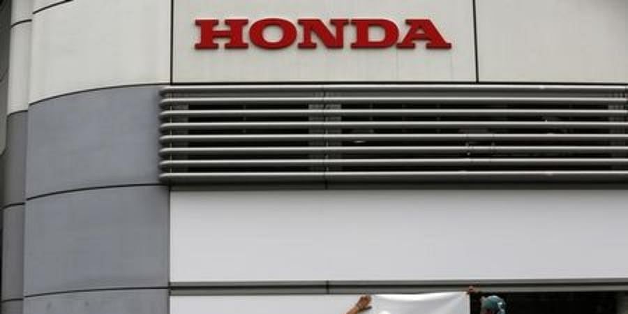 Japan's Honda sees profit slide on chips, material cost woes