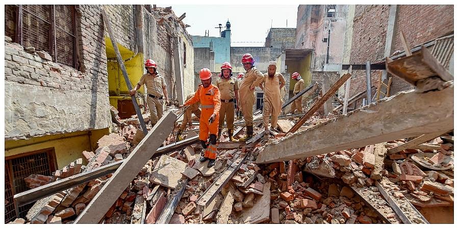 Three labourers among five rescued in building collapse at Azad market ...
