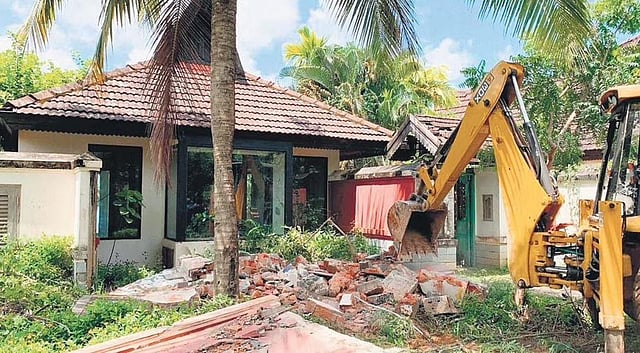 Kapico Resort razing begins, debris moved to mainland