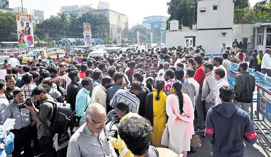 People wait in serpentine queues to attend Prajavani