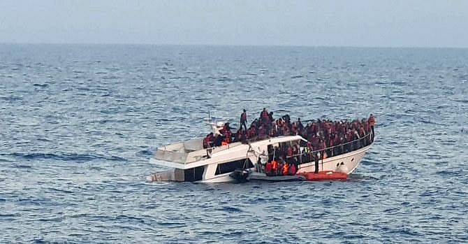 A wooden boat carrying dozens of Rohingya Muslim migrants capsizes off ...
