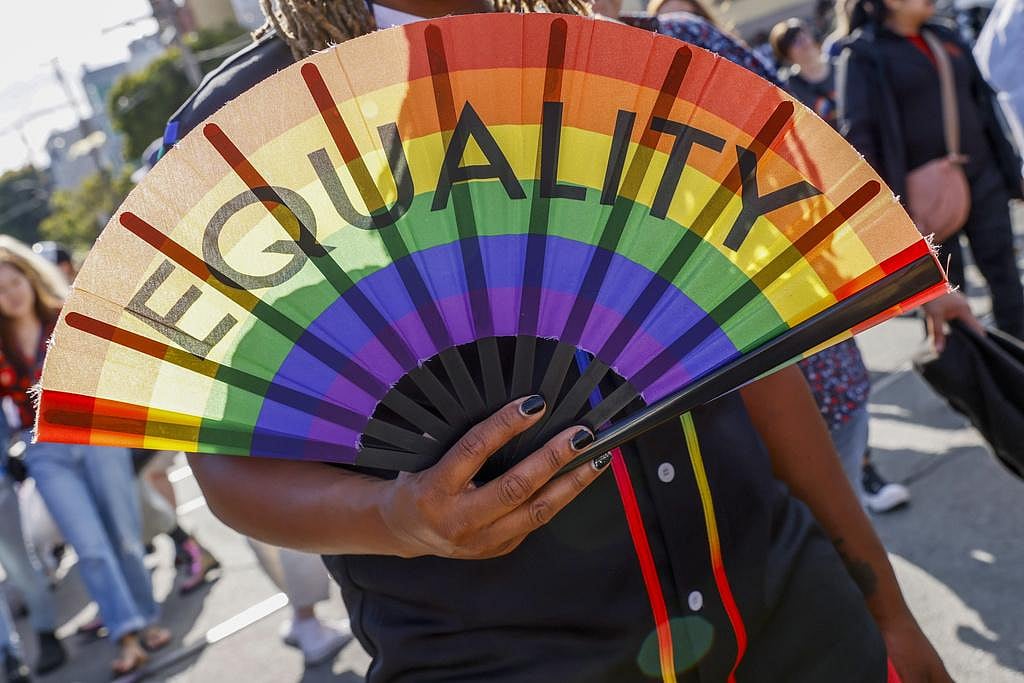 Party and protest mix as LGBTQ+ pride parades kick off from New York to ...