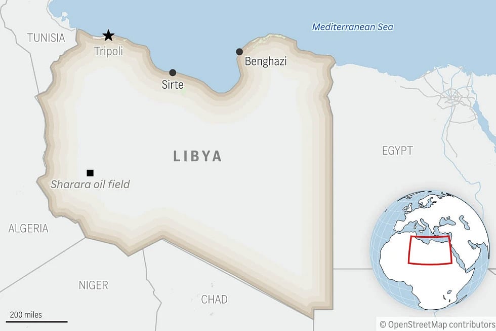 A boat carrying migrants sinks off the Libyan coast with at least 19 ...