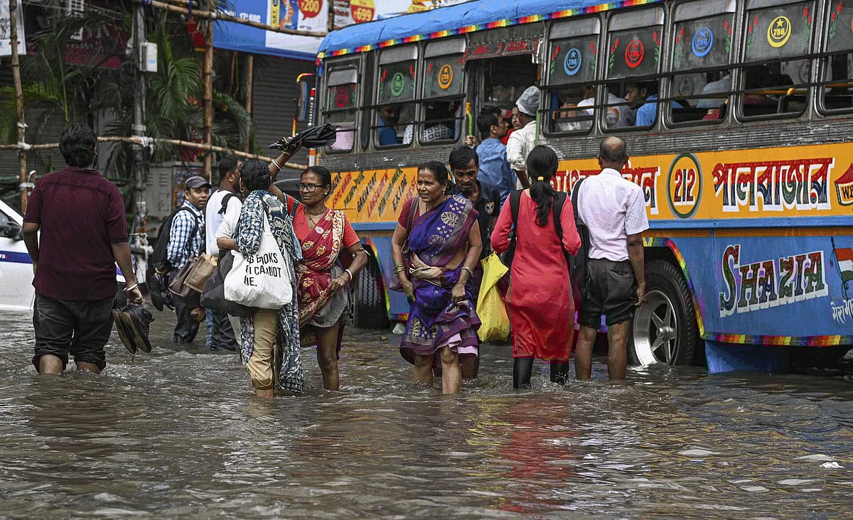 At least 10 die of electrocution after heavy rains flood Kolkata ...
