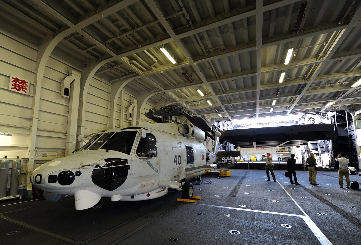 One dead, seven missing after two Japanese military helicopters crash