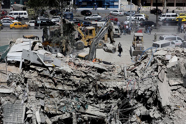 Iran vows to punish Israel for deadly strike on its embassy annex in Syria