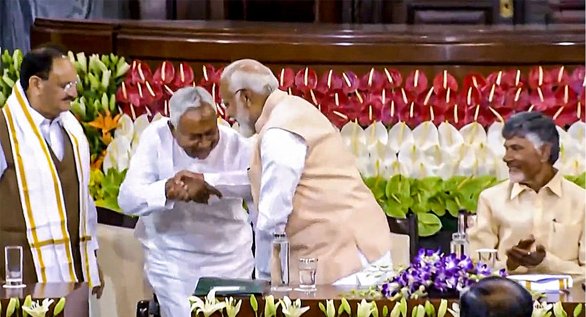 Flutter as ‘kingmaker’ Nitish Kumar tries to touch Modi’s feet