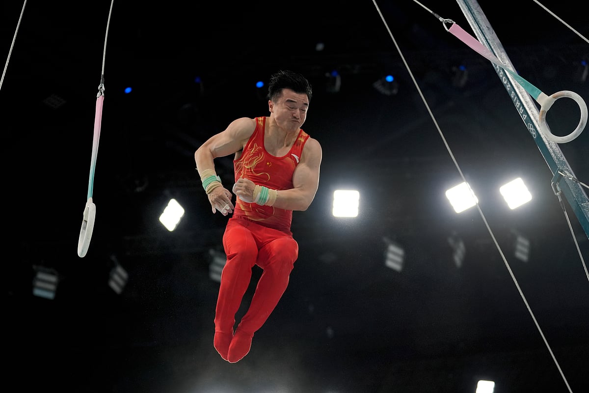 Olympics: Liu Yang defends gymnastics gold, edges teammate Zou Jingyuan