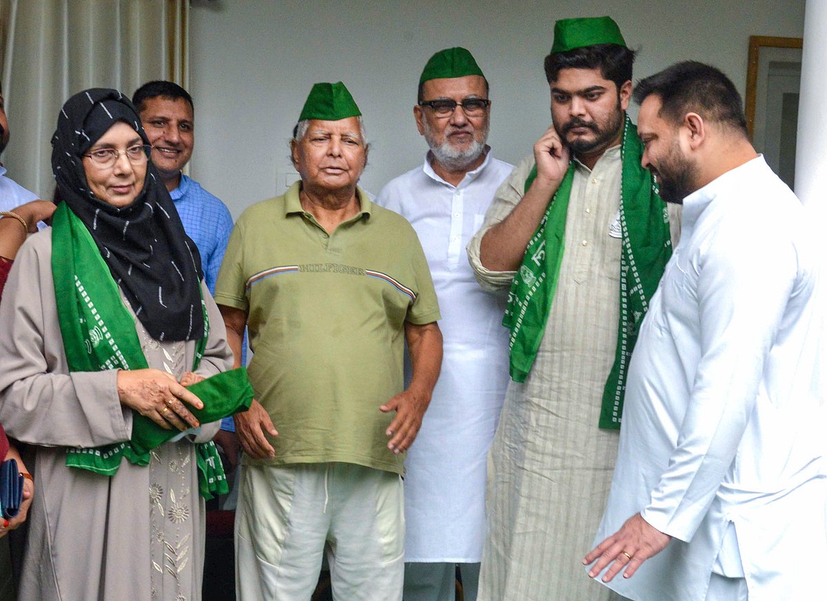 Former Siwan MP Mohammad Shahabuddin's wife Hena Shahab and son Osama ...