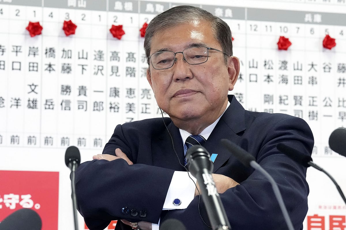 Japan's prime minister vows military buildup, deeper ties with the US ...