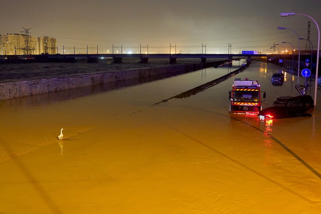 Flash floods in Spain sweep away cars, disrupt trains and leave several ...