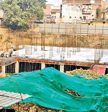 Construction of cultural complex on pond land in Delhi's Vikaspuri ...