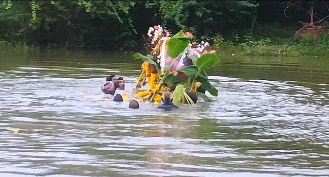 Villagers carry 92-year-old's body in neck-deep water; collector ...