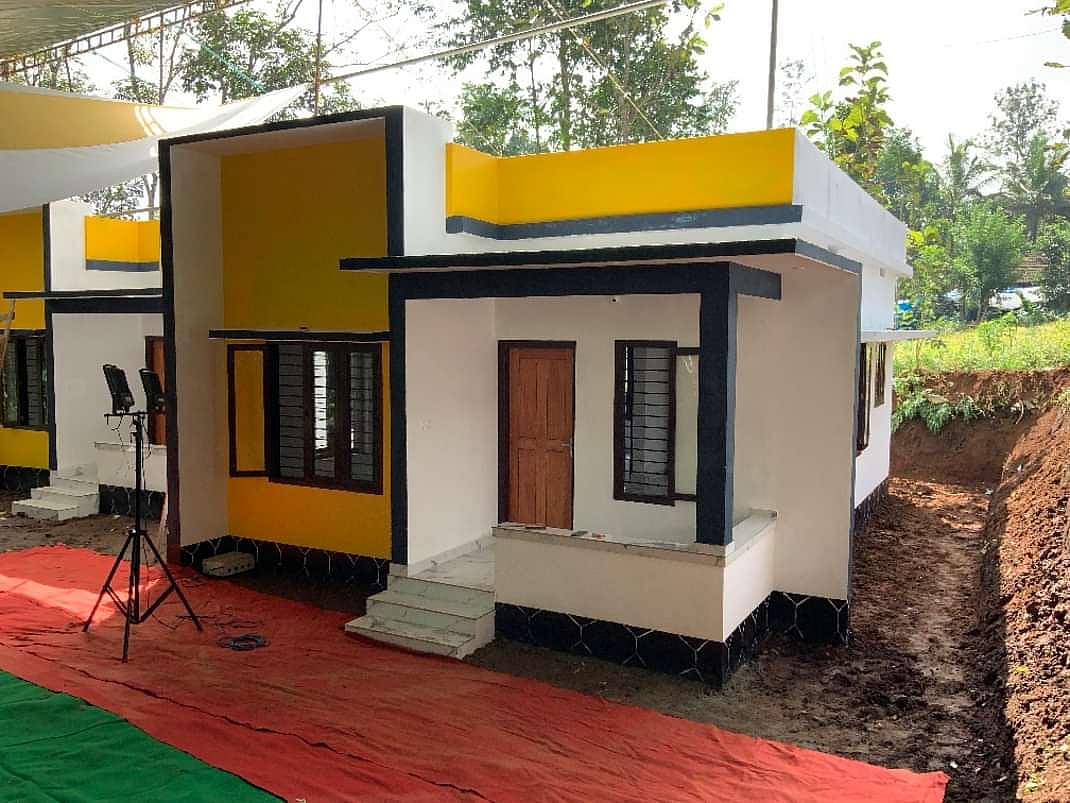 Foundation rebuilds life, hands over 14 houses to Wayanad victims