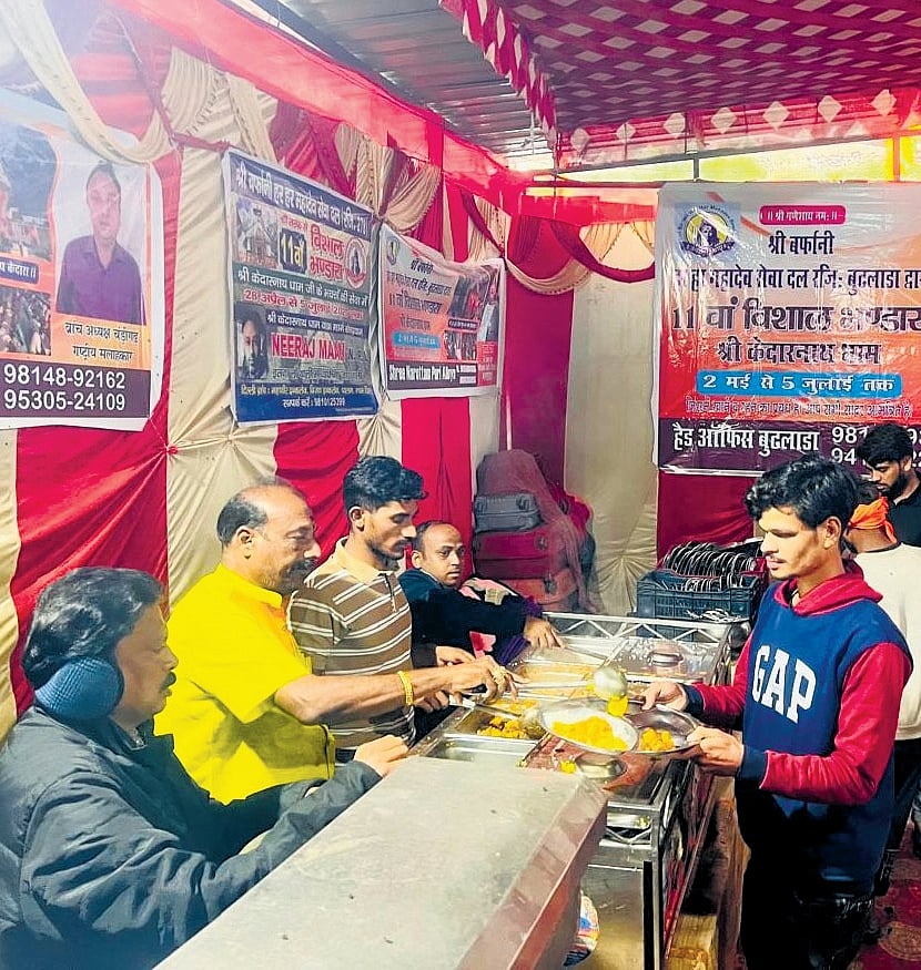 Serving snacks at shiva shrine
