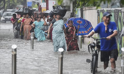 'Red' alert in Mumbai as heavy rains disrupt flight, train, metro services; traffic hit due to ...