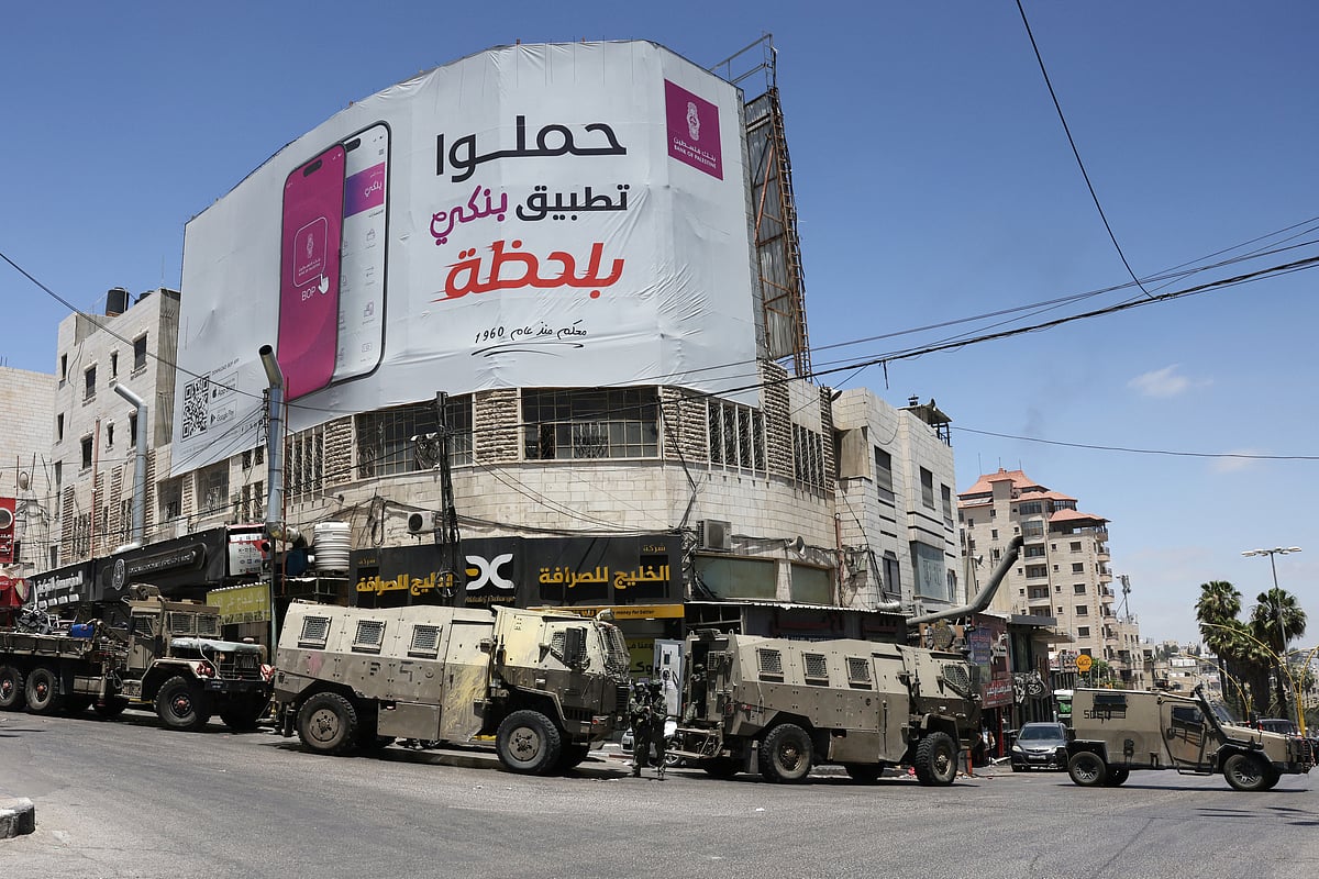 Israeli forces raid foreign exchange stores across West Bank