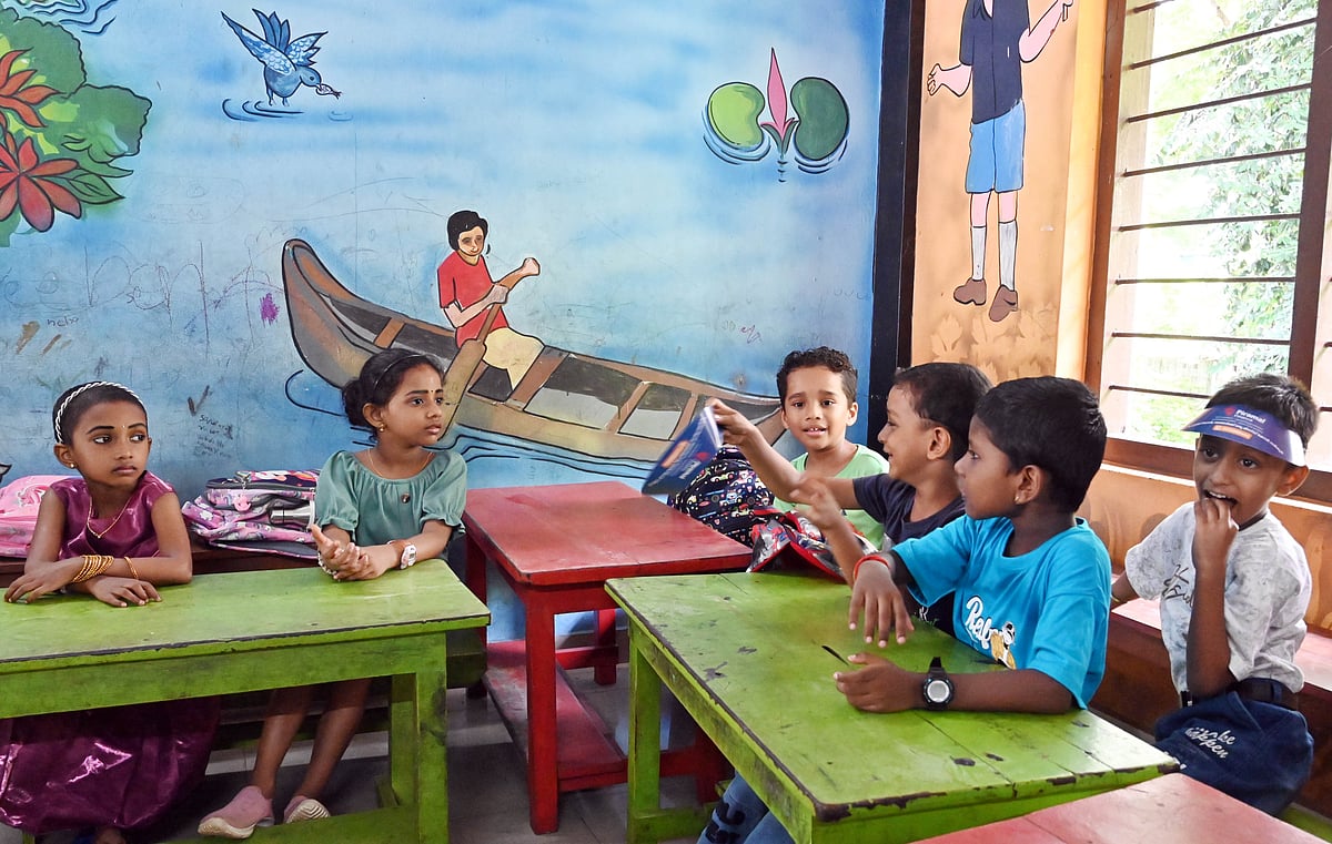 Laughs fill the classroom as lessons commence in Kerala schools