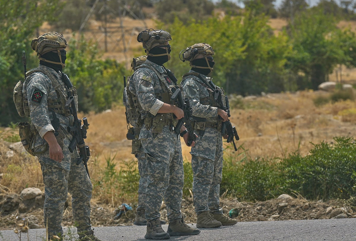 Kurdish PKK fighters begin laying down weapons as part of peace process ...