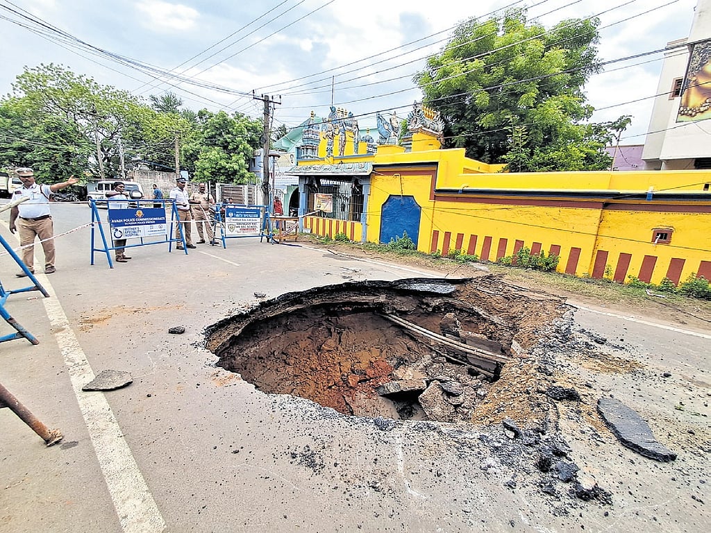 UGD pipe leakage: Road caves in at Ambattur, narrow escape for biker