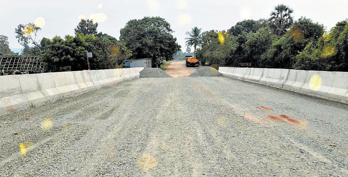 Road to private property built on lakes near Vandalur under Namakku ...