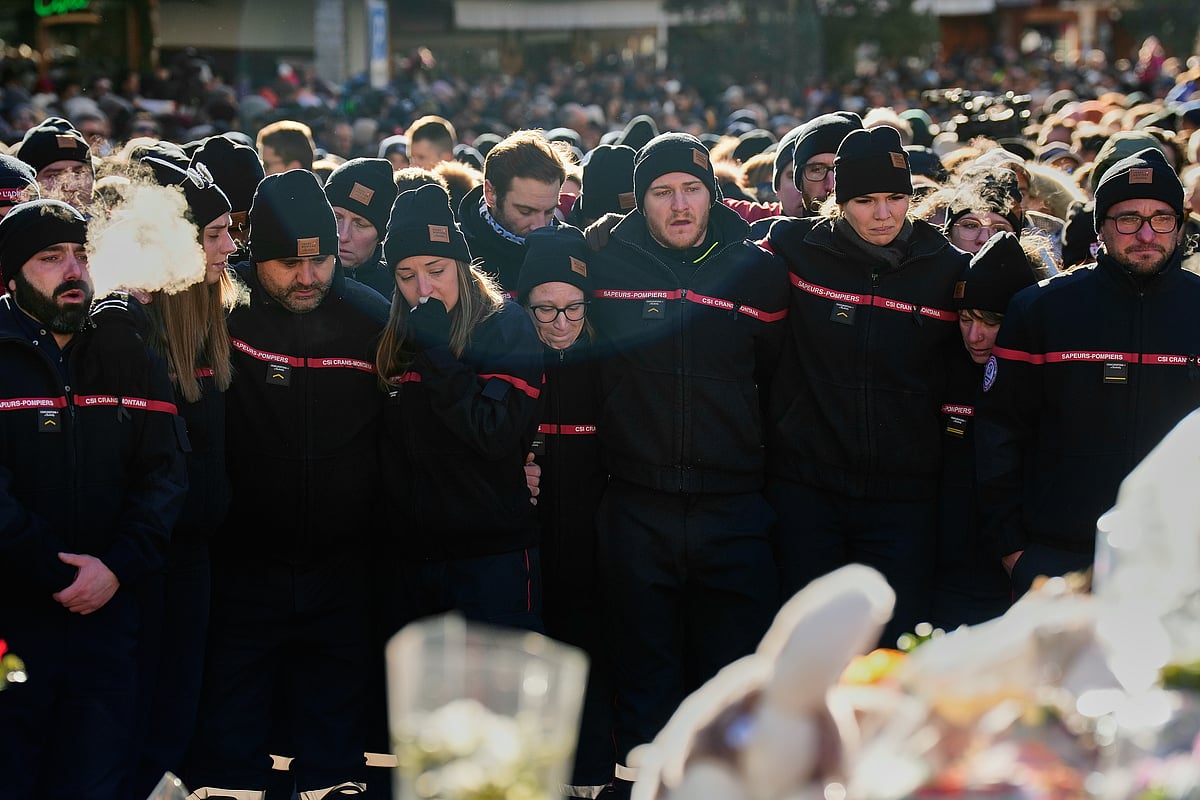'Left to party in paradise': Hundreds march in silence to honor victims ...