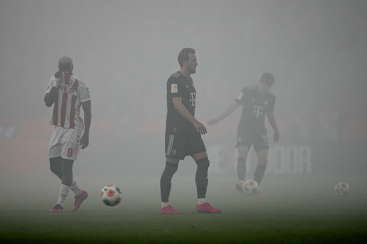 Bayern Munich beats Cologne and sets a record after smoke stops play in ...
