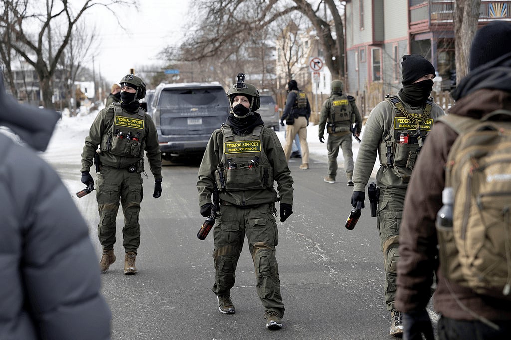 Protesters demand immigration agents leave Minneapolis after man is ...