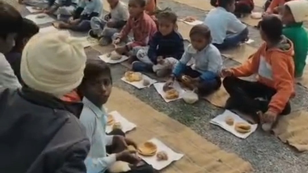 Children served mid-day meal on torn notebook pages, waste paper in MP ...