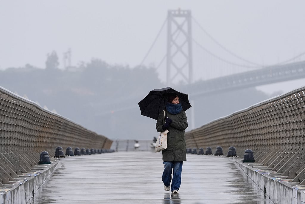 California walloped by winter storm with high winds and heavy rain and snow
